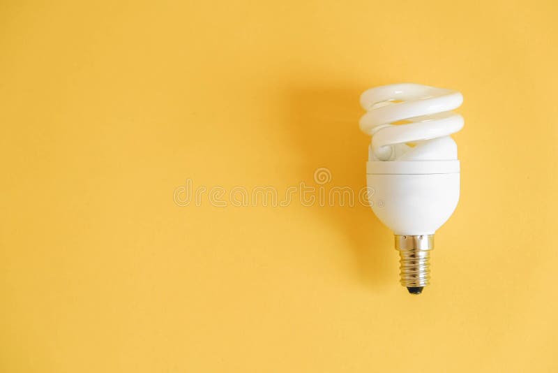 LED Light Bulb on Yellow Background. Top View Stock Image - Image of ...