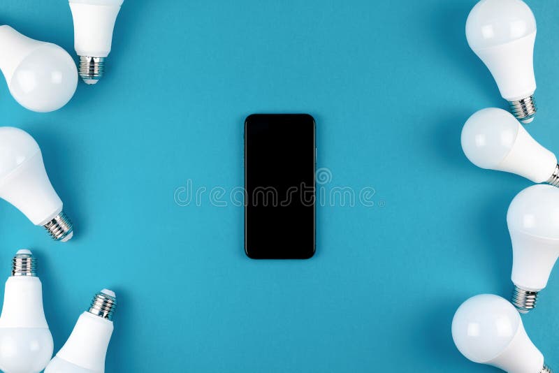LED Light Bulbs and Modern Smartphone Mockup Stock Photo - Image of ...