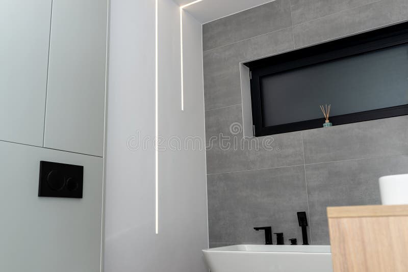 LED Light Strips Mounted in the Wall in a Modern Bathroom, Visible ...