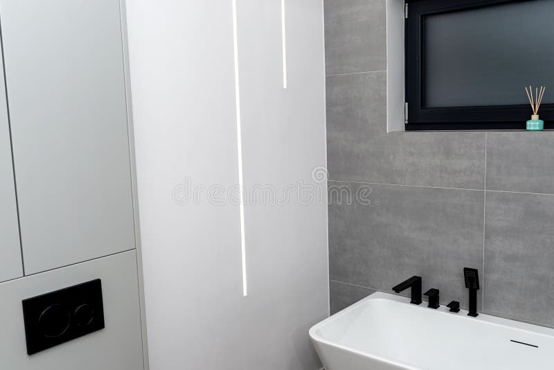 LED Light Strips Mounted in the Wall in a Modern Bathroom, Visible ...