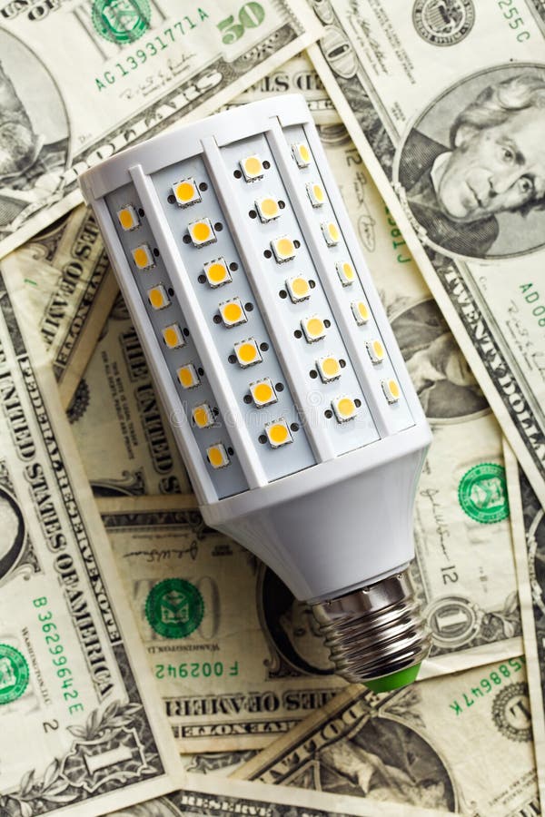LED Lightbulb with American Dollars Stock Photo - Image of technology ...