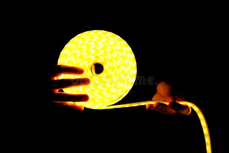 Led Lighting Logo, LED Strip in Hands in the Dark Stock Image - Image ...