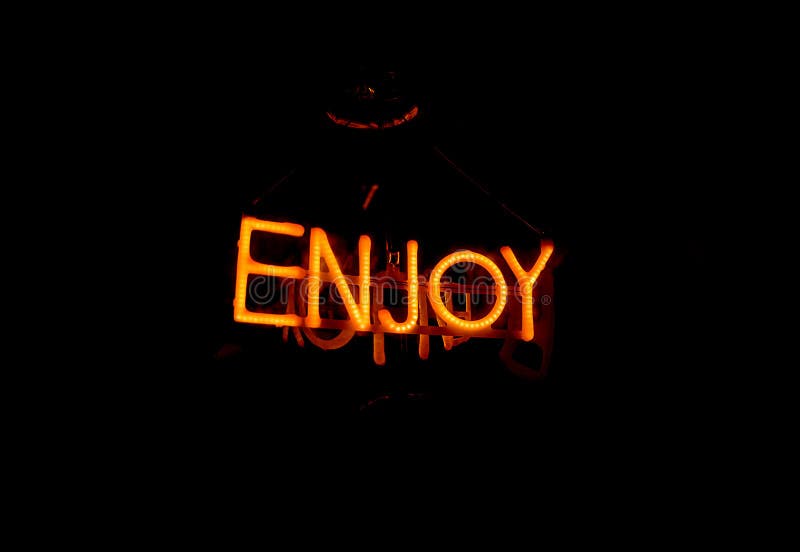 LED Sign Enjoy. Inscription Enjoy Inside the Lamp. Stock Image - Image ...