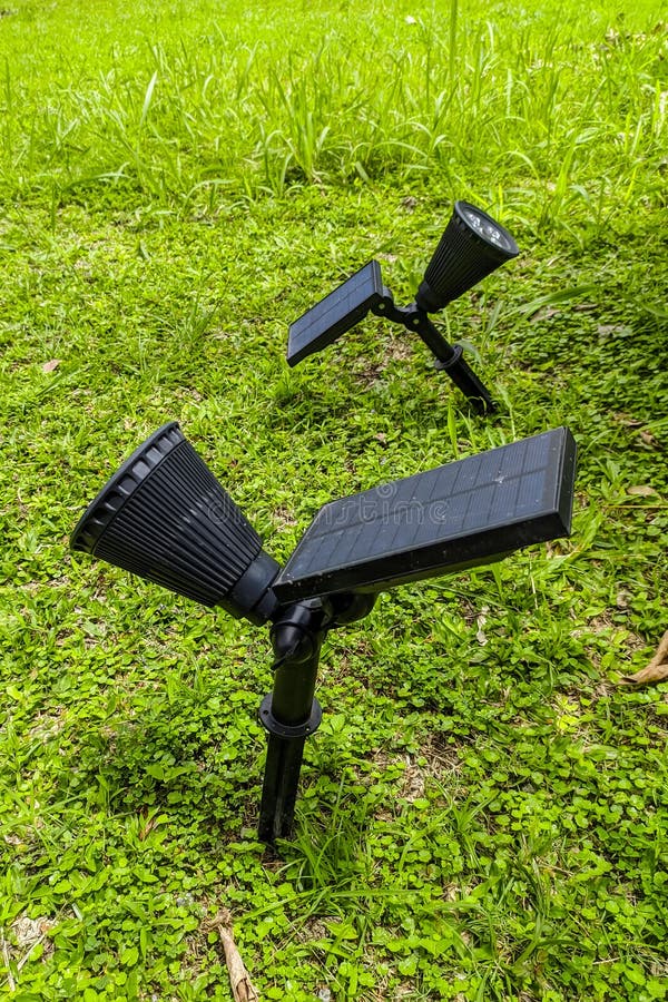 LED Spotlight Outdoor Solar Panel Power Plugged into the Grass Stock ...