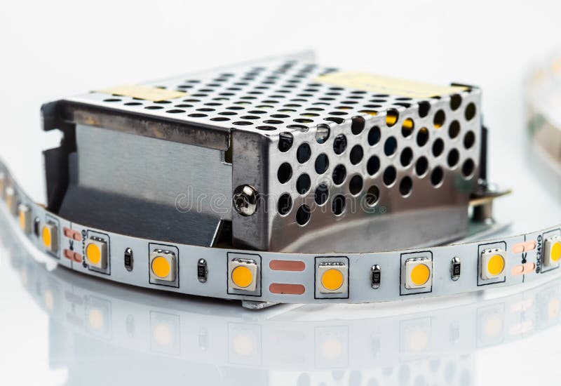 LED Strip for 24 Volt Voltage with Power Supply on a White Background ...
