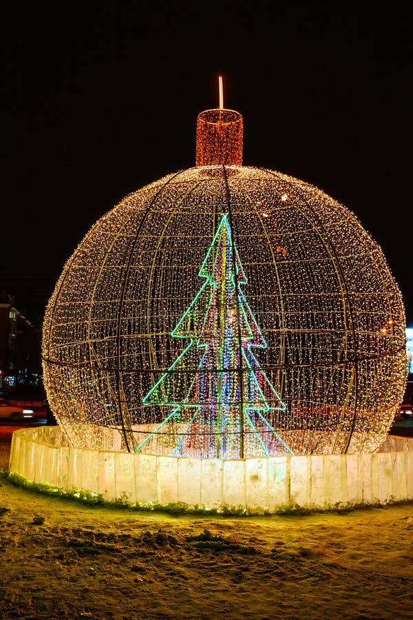 LED Tree Inside Huge Christmas Ball on the Street. Christmas ...