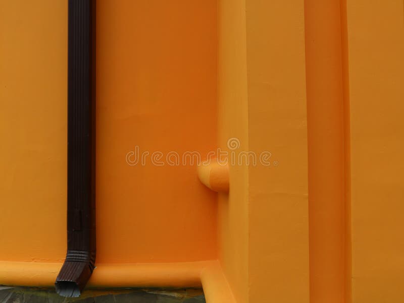 Ledge of an Urban Orange Building with a Drainage System Stock Photo ...