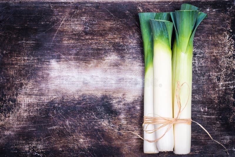 Leek on rustic background. stock image. Image of agriculture - 65904897