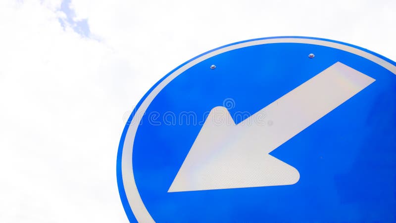 Left Arrow Traffic Sign with the Sky Stock Image - Image of background ...
