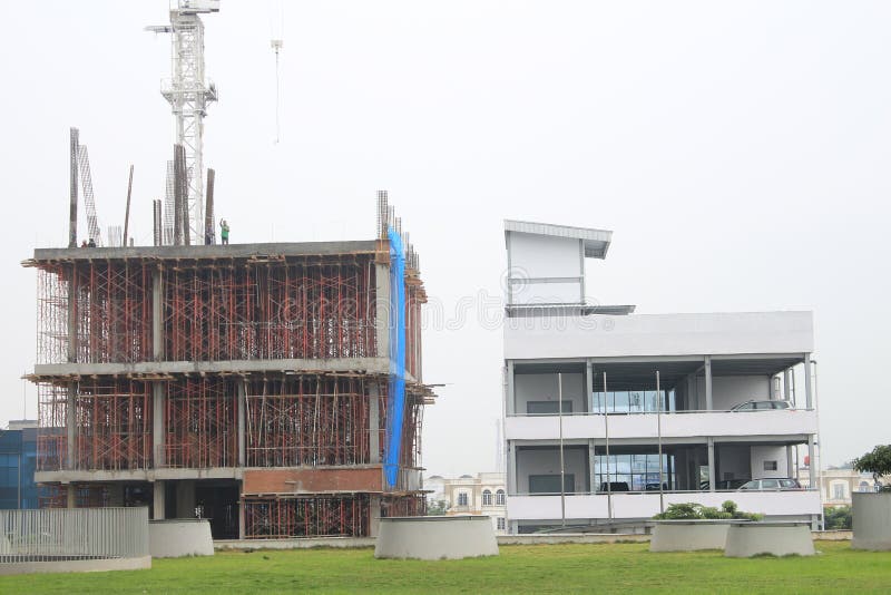 The Left Building is Under Construction and the Other Building is ...