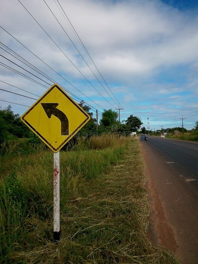 Left Curve Sign Warning on the Road Stock Photo - Image of right ...