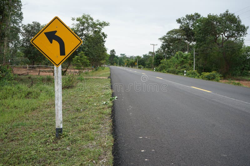 Left Curve Warning Sign for Travel Safety Stock Photo - Image of limit ...