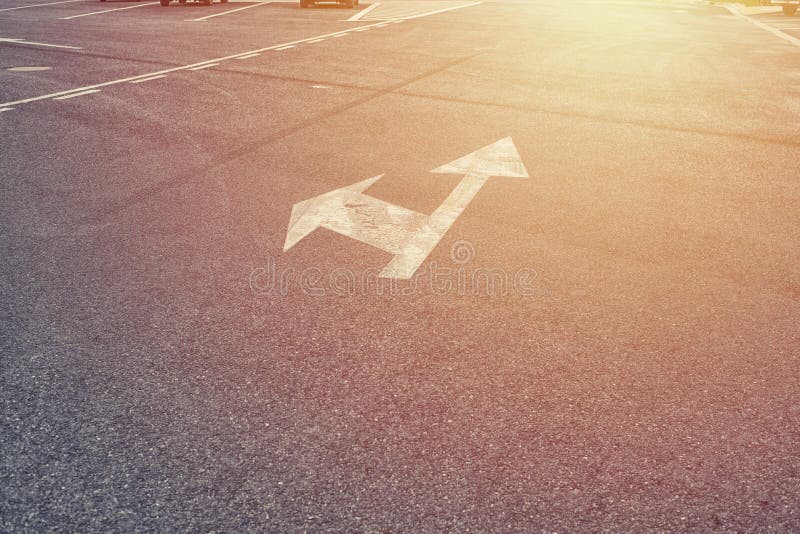 Left and Forward Arrow on the Streer with Sunrise Light Stock Image ...