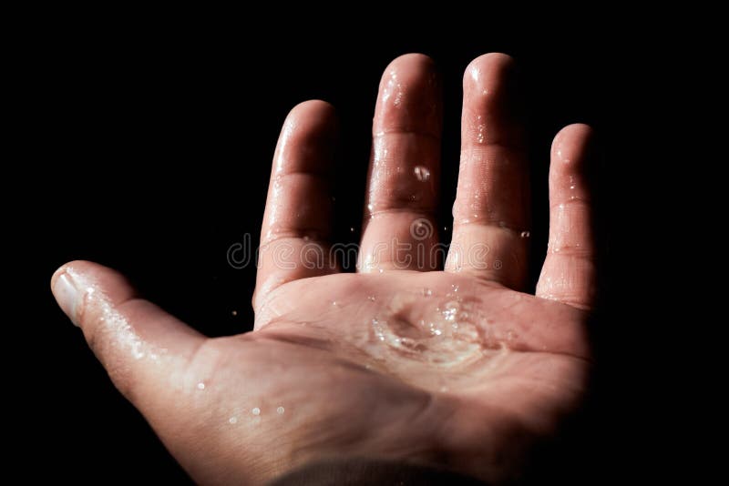 A Left Hand with a Few Drops of Rain Stock Photo - Image of poor ...
