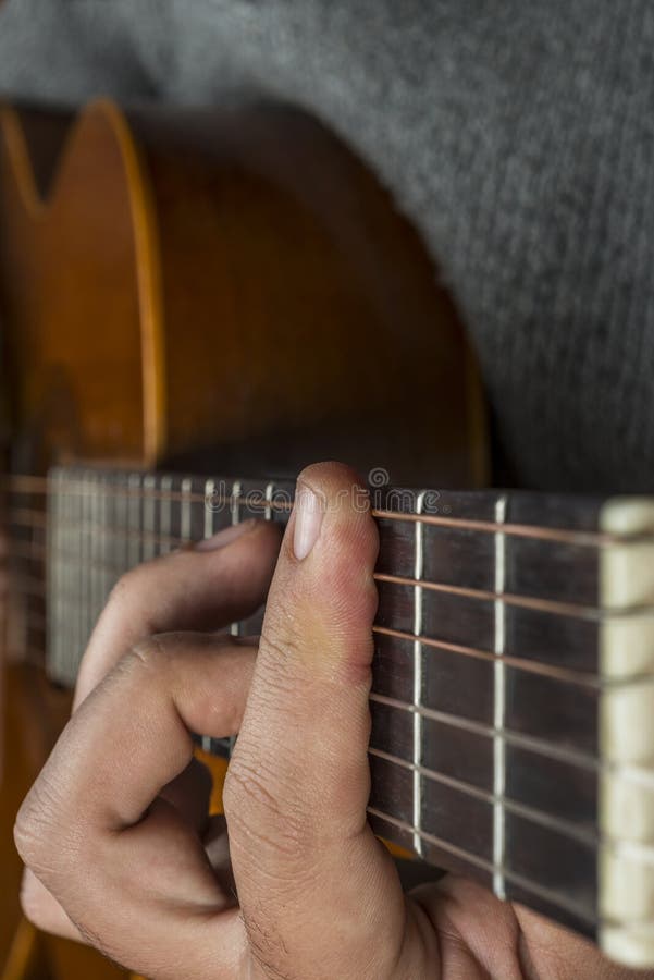 Left hand on the guitar stock photo. Image of guitarist - 95513614