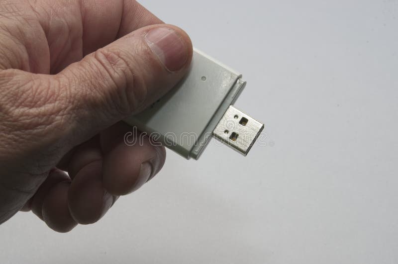 Left Hand Holding a USB Jump Drive Adapter Stock Photo - Image of ...