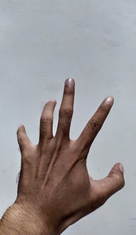 The Left Hand of a Man with Brown Skin Stock Photo - Image of left ...