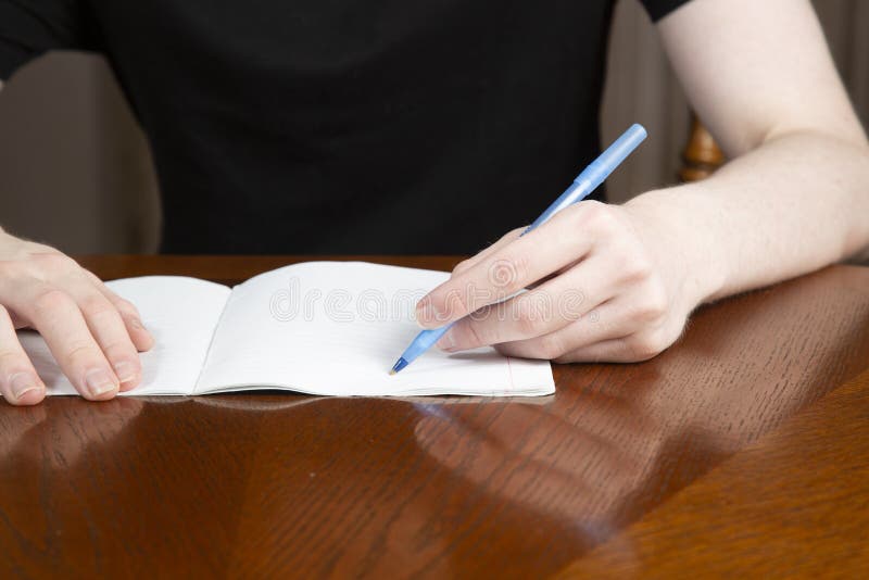 Left-handed.a Man Who Writes with His Left Hand Stock Image - Image of ...