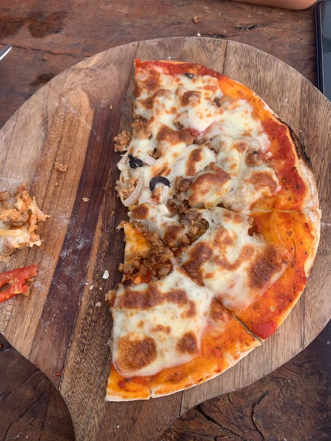 Left over pizza stock photo. Image of pizza, wood, outdoor - 265985354