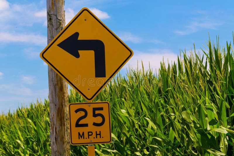 Sharp Left Turn Arrow Sign stock photo. Image of bend - 74665282