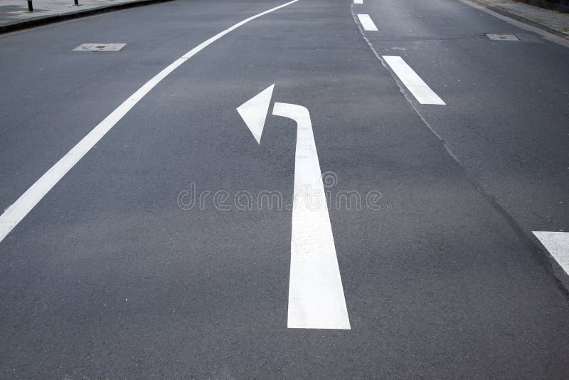 Left Turn Arrow in Street stock photo. Image of urban - 66140052