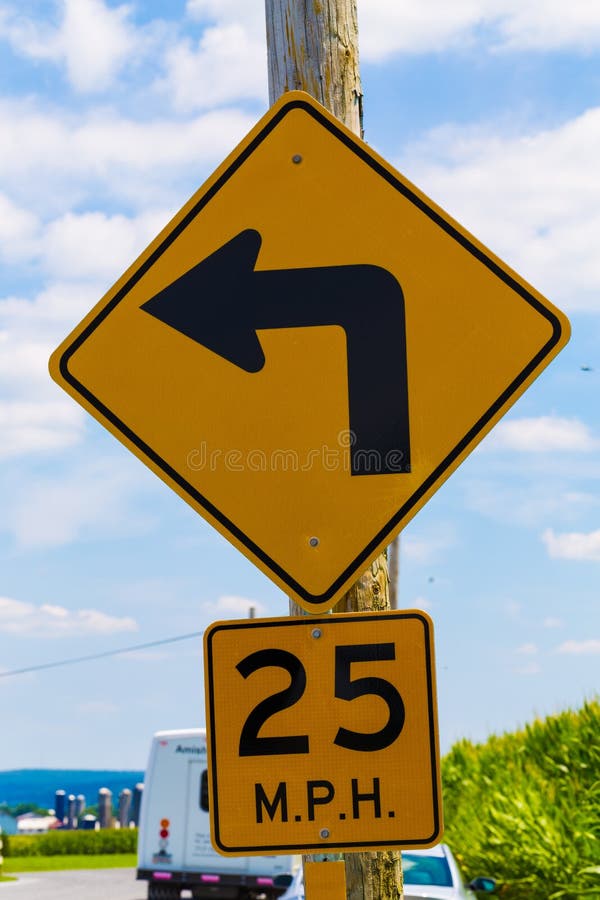 Left Turn ArrowSign 25 MPH stock photo. Image of sign - 74649730