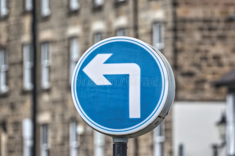 Left Turn Traffic Sign in Urban Setting Stock Image - Image of safety ...