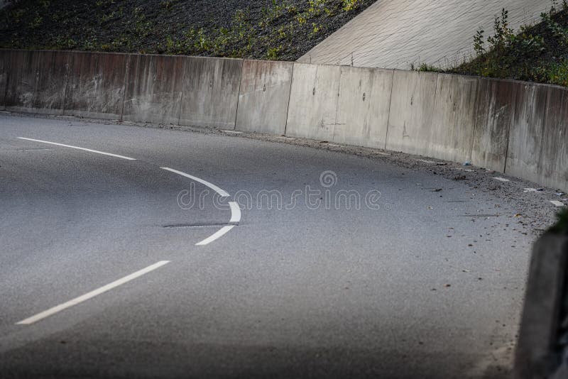 Left Turning Road Underneath Bridges.. Stock Photo - Image of outdoors ...