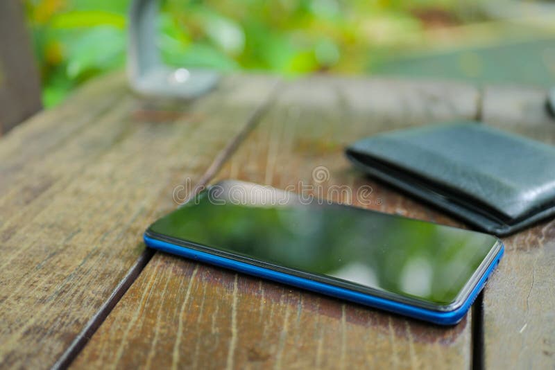 Left Wallet on a Bench in the Park Stock Image - Image of pocket ...