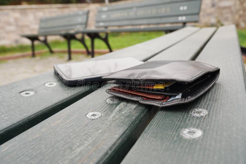 Left Wallet on a Bench in the Park Stock Photo - Image of theft ...