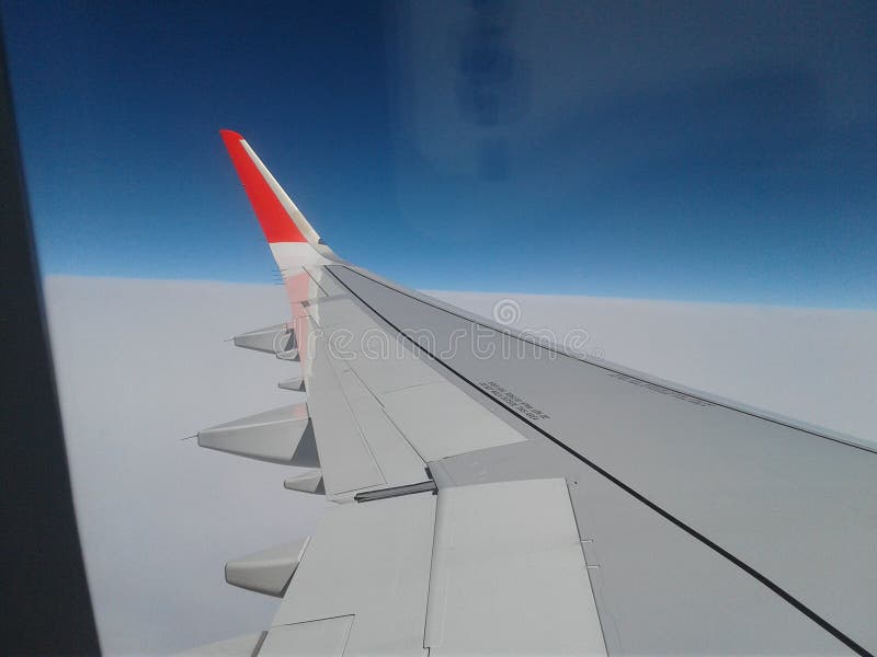 Airplane in blue sky stock image. Image of aircraft - 100485853