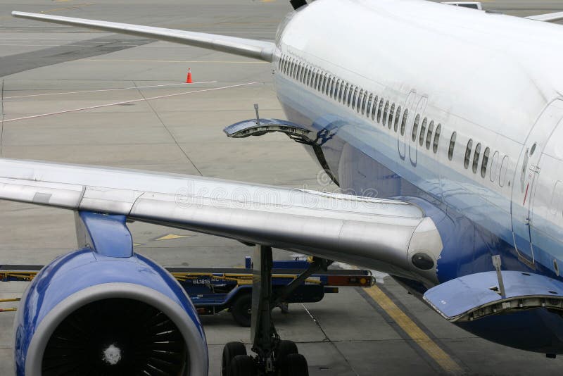 Left Wings of a Commercial Airplane Stock Image - Image of blur ...