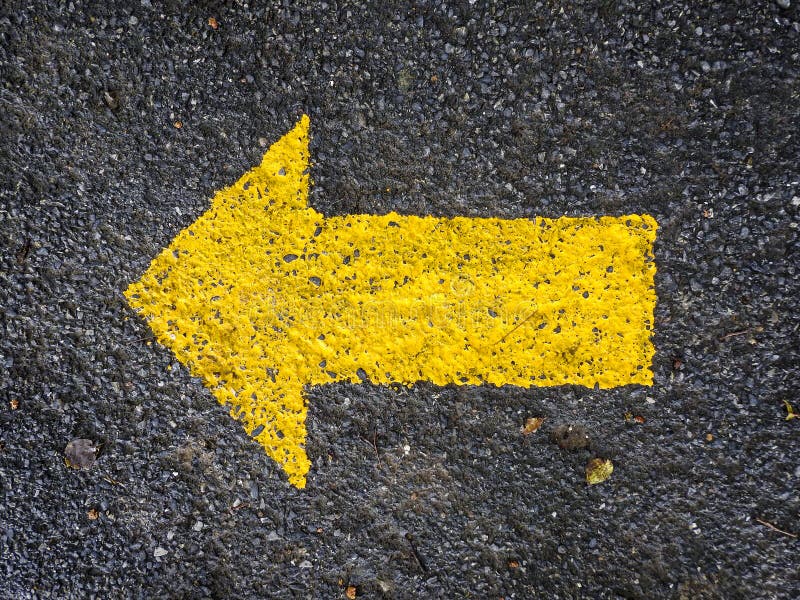Left yellow arrow sign stock photo. Image of turn, direction - 73996098
