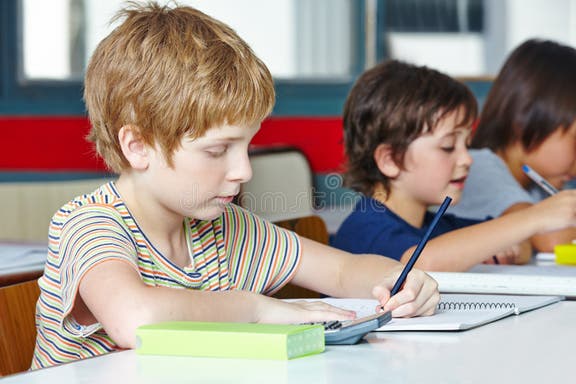Lefthanded Boy in Elementary School Stock Image - Image of class, task ...