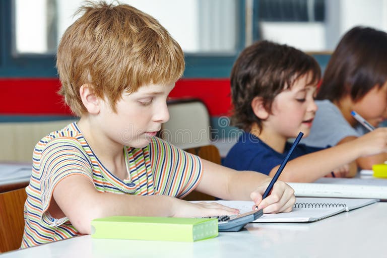 Lefthanded Boy in Elementary School Stock Image - Image of class, task ...
