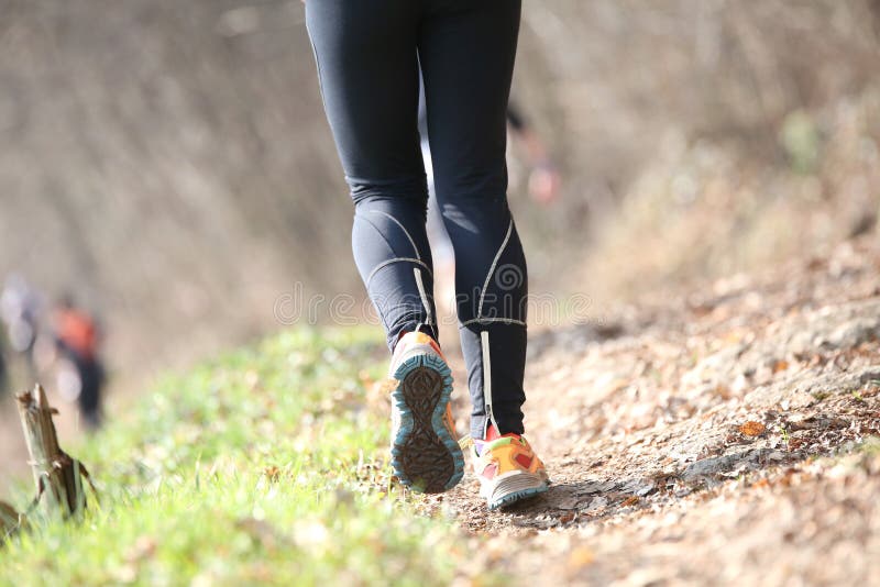 Leg of Athlete Runner from Behind during Racing on the Mountain Stock ...