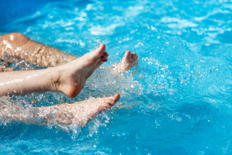 Leg Female in the Water in the Pool, Close-up. Stock Image - Image of ...