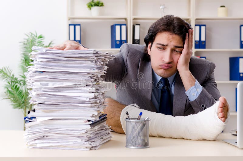 Leg Injured Employee Working in the Office Stock Photo - Image of ...