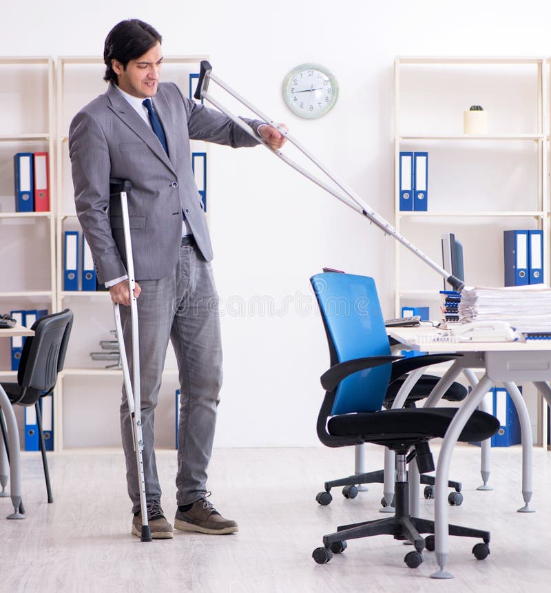 Leg Injured Male Employee Working in the Office Stock Image - Image of ...