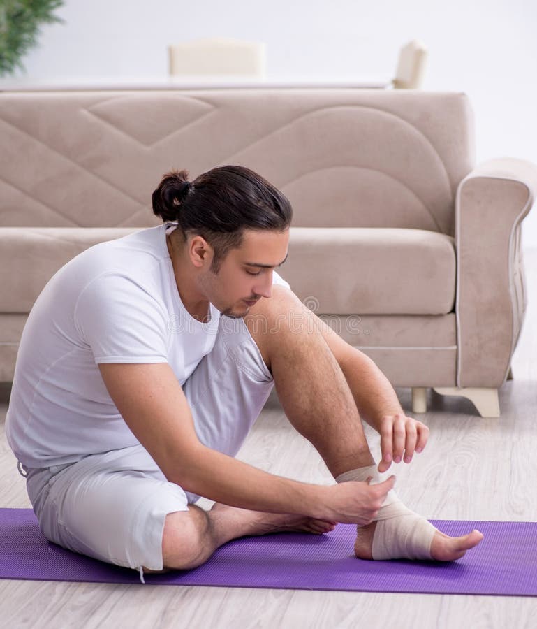 Leg Injured Man Doing Exercises at Home Stock Image - Image of home ...