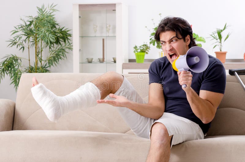 Leg Injured Young Man Suffering at Home Stock Image - Image of bullhorn ...