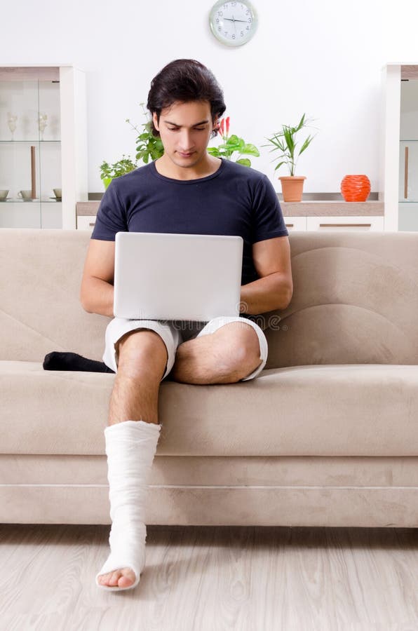 The Leg Injured Young Man Suffering at Home Stock Image - Image of ...