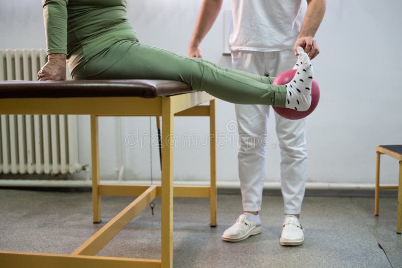 Leg Therapy Exercise with Ball Stock Image - Image of exercisemat ...