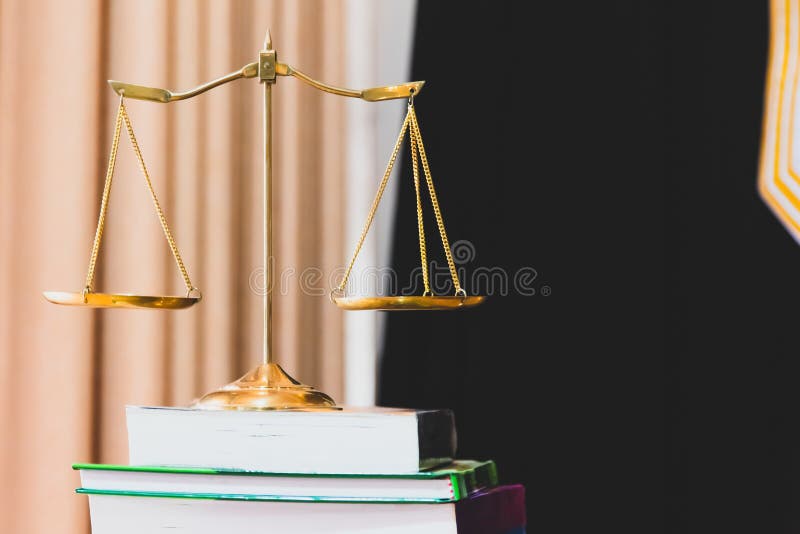 Legal Scale on a Book with Judge`s Uniform Background Stock Image ...
