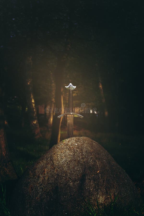 Legendary Excalibur sword stock photo. Image of rock - 71910728