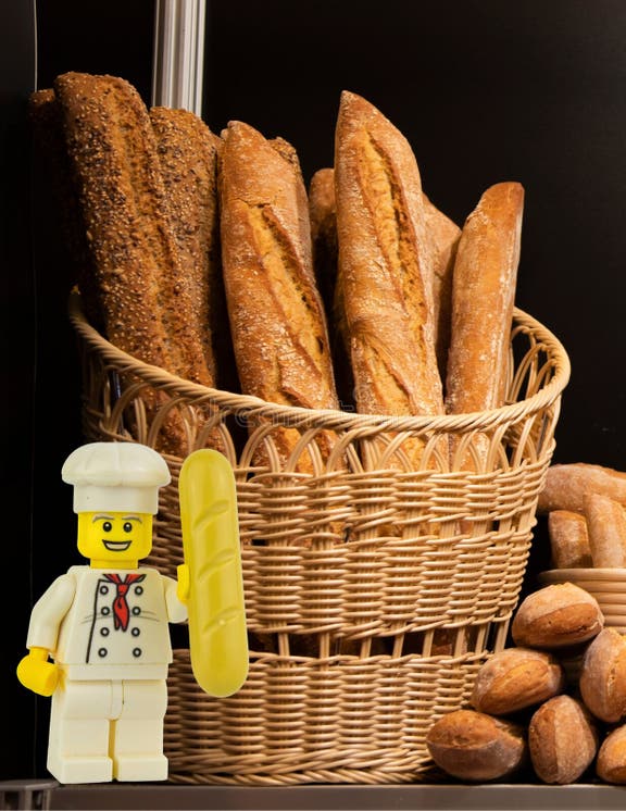 Lego Mini Character Holding a Loaf of Bread Editorial Stock Photo ...