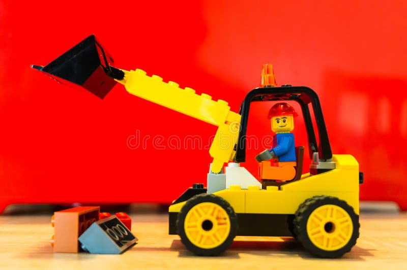 Lego Toy Construction Worker Moving Bricks Stock Photos - Free ...