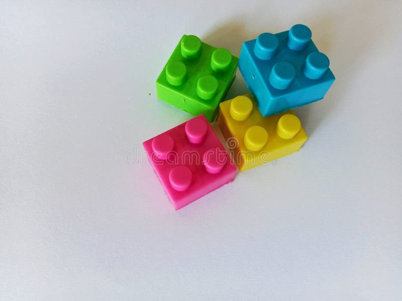 Lego Toys in Blue, Yellow, Green and Red on White Stock Image - Image ...
