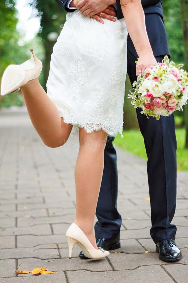 Legs of bridal couple stock photo. Image of marriage - 72501346