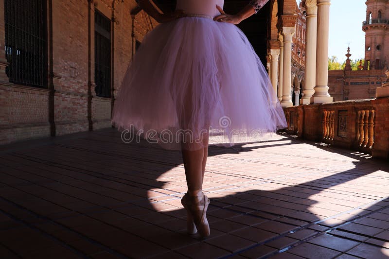 Legs of a Classical Ballet Dancer in Which she is Standing on Tiptoe ...